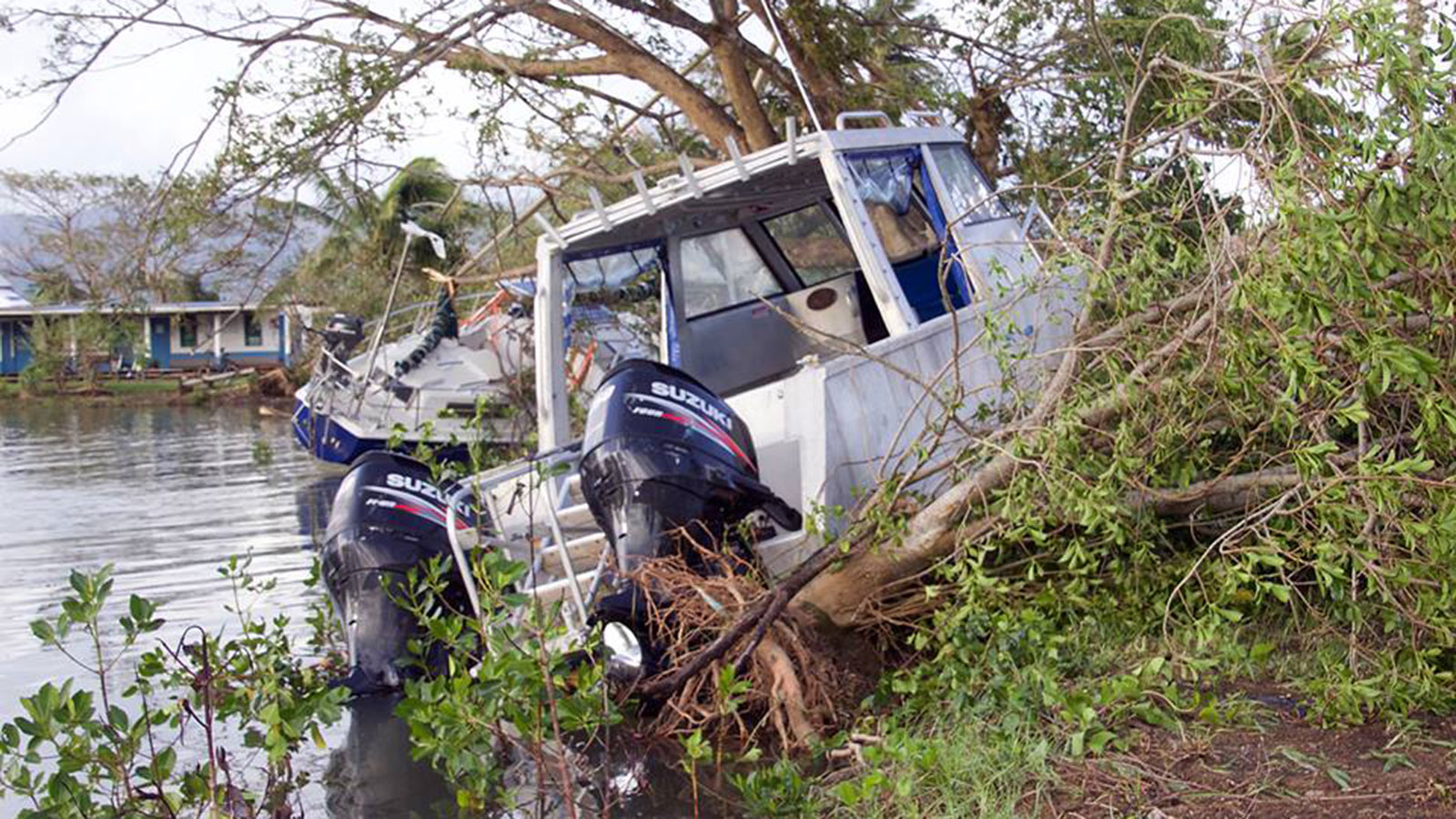 Boats washed ashore in Fiji by devastating Cyclone Winston